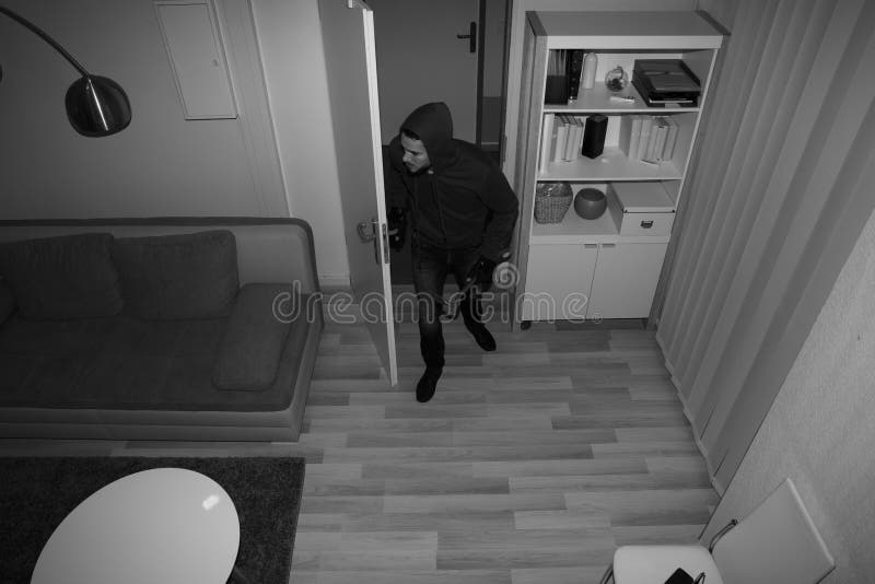 Thief Entering into House stock image. Image of male - 210428769