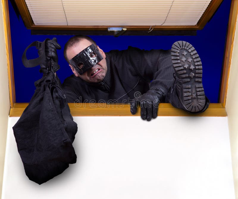 Sneaky Robber Ready To Steal Something at Home Stock Photo - Image of ...