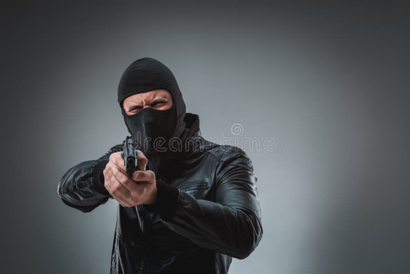 Robber with a Gun, Studio Shot Stock Photo - Image of evil, fear: 93495434