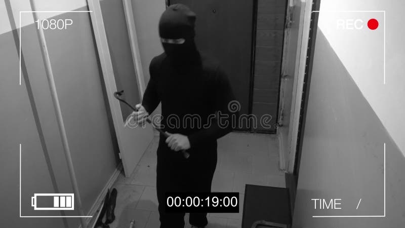 Surveillance Camera Caught the Robber in a Mask Running Off with a Bag ...