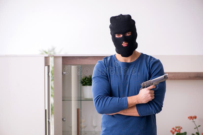 Male Robber Stealing Valuable Things from the House Stock Image - Image ...