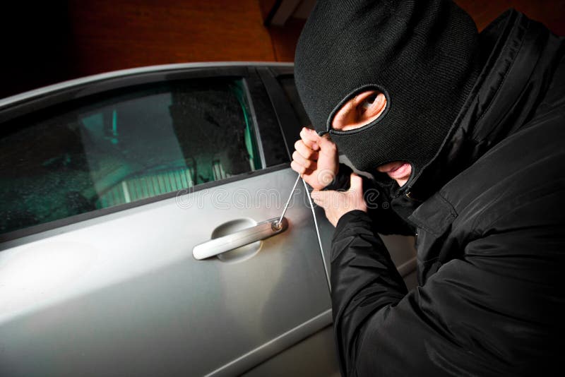 Robber and the Thief in a Mask Hijacks the Car Stock Image - Image of ...