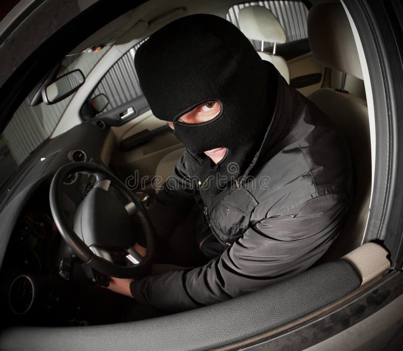 Robber and the Thief in a Mask Hijacks the Car Stock Image - Image of ...