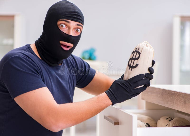 Robber Wearing Balaclava Stealing Valuable Things Stock Photo - Image ...