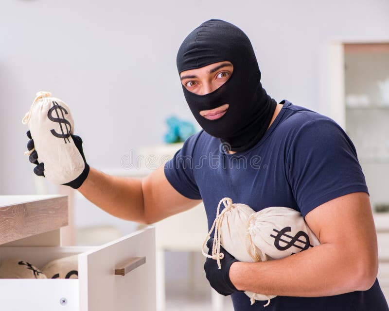 Robber Wearing Balaclava Stealing Valuable Things Stock Photo - Image ...