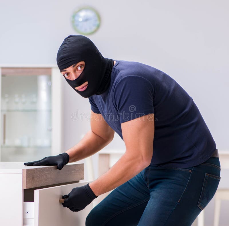 Robber Wearing Balaclava Stealing Valuable Things Stock Image - Image ...