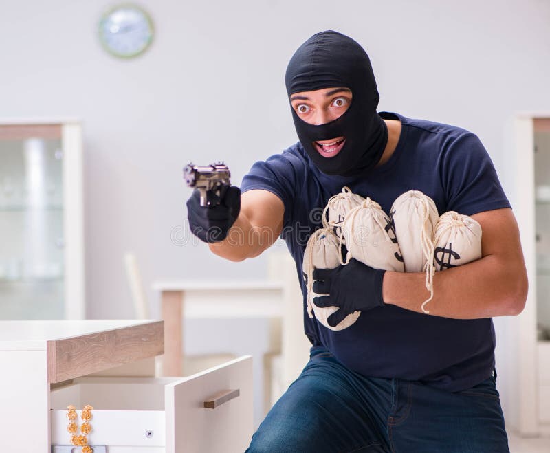 Robber Wearing Balaclava Stealing Valuable Things Stock Photo - Image ...