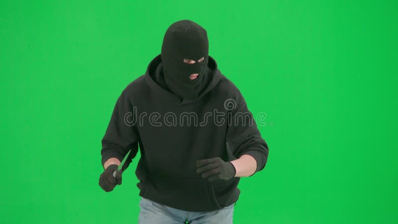Portrait Of Thief On Chroma Key Green Screen Background Man Robber In