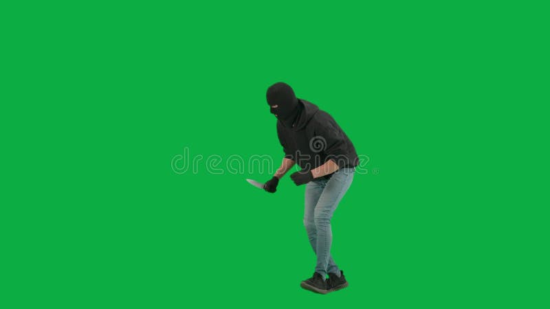 Portrait Of Thief On Chroma Key Green Screen Background Man Robber In