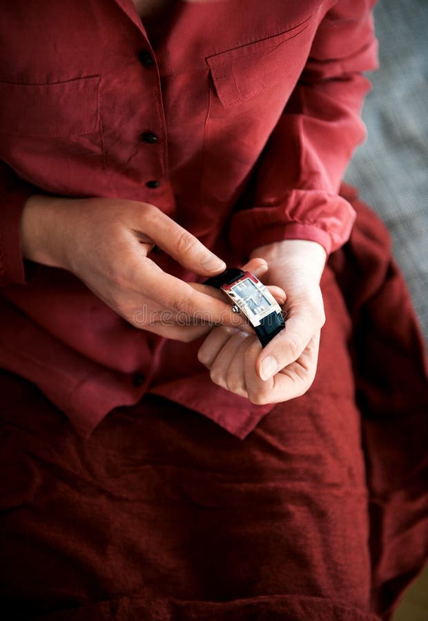 Robe Woman Hands Holding Luxury Golden with Red Leather Strap Stock ...