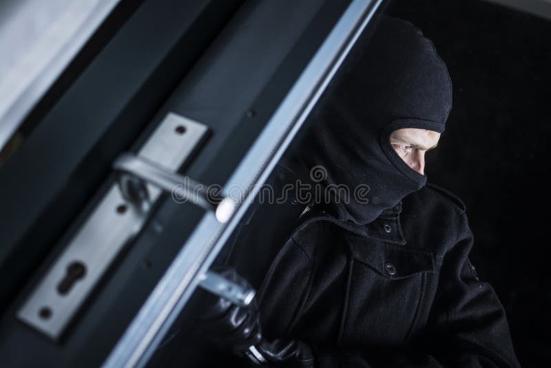 Robo imagen de archivo. Imagen de tarde, barra, delincuente - 35575723