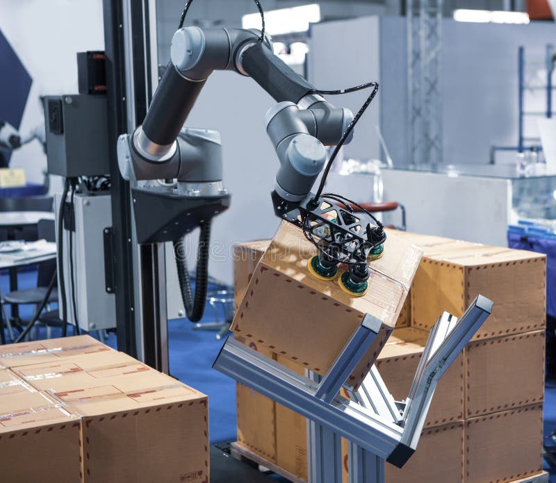 Robot arm handling carton stock image. Image of future - 279021095