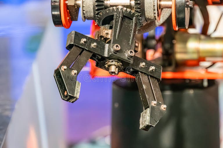 Robot Arm, Metallic Structure, Overhead Light, Sharp Shadows, Multiple ...