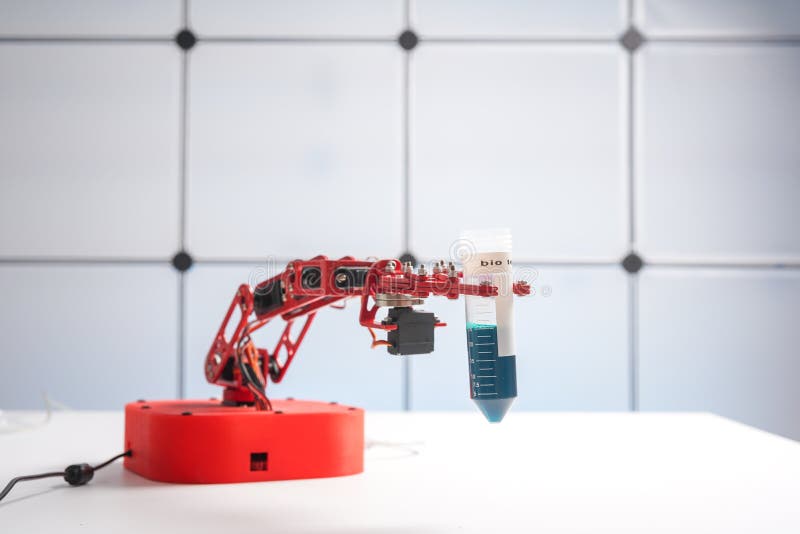 Robot Arm with Test Tube with Biological Sample in Science Laboratory ...