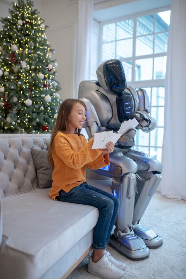 Robot and a Cute Girl Sitting on the Sofa Stock Image - Image of ...