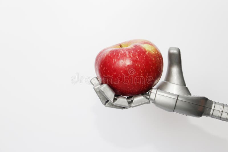 A Robot Hand is Holding a Red Apple. Concept Stock Image - Image of ...