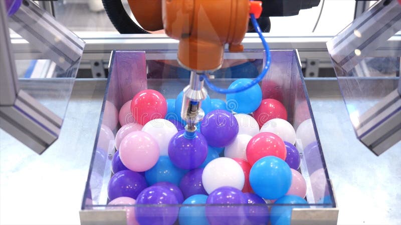 Robot Hand Machine Picking Up Ball. Media. Use Smart Robot in ...