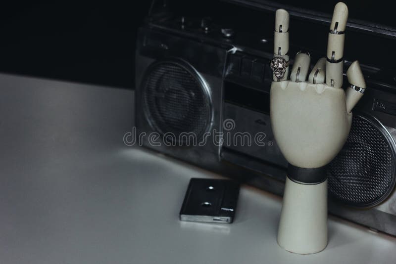 Robot Hand with Silver Ring Making Rock Sign Stock Image - Image of ...