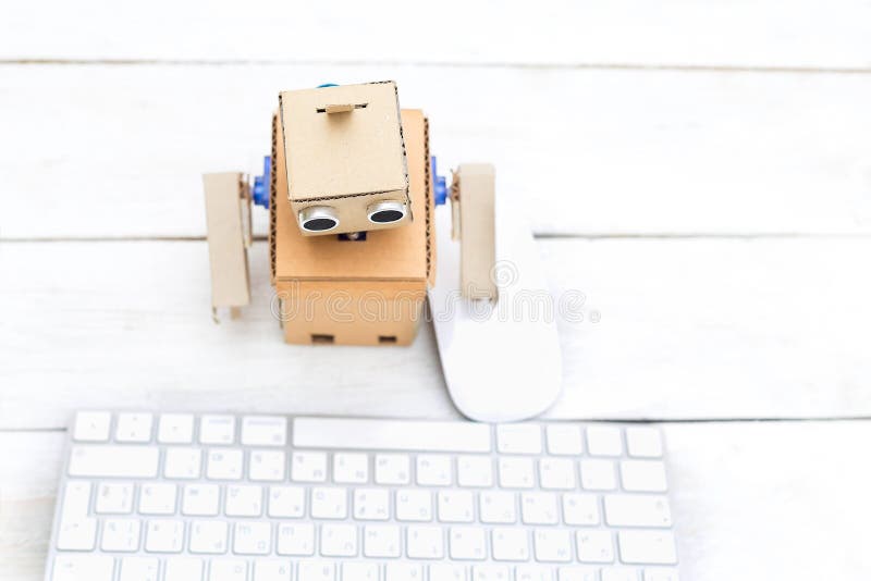 Robot and Its Workplace with a Keyboard and Mouse. Flat Lay Stock Photo ...