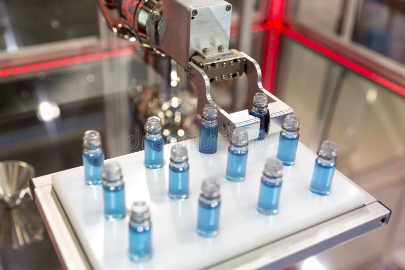 Robot Mechanical Arm with Chemical Tubes in a Medical Laboratory Stock ... Robot Mechanical Arm with Chemical Tubes in a Medical Laboratory Stock ...