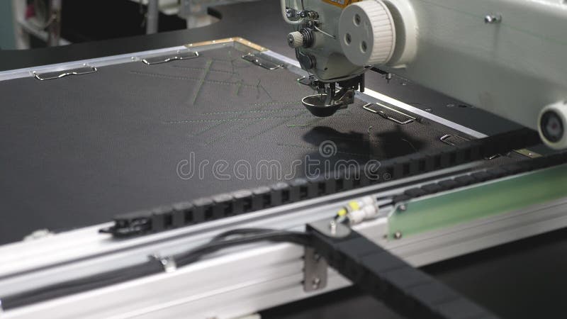 Robot Sewing Machine. Computer Controls the Sewing Machine. Automatic ...