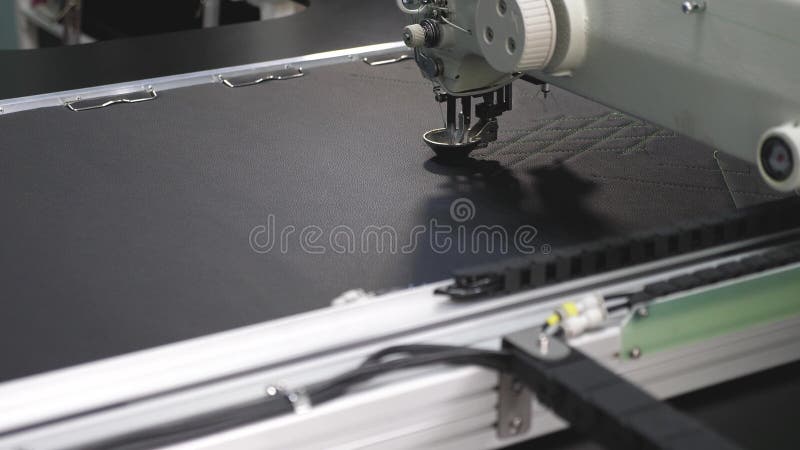 Robot Sewing Machine. Computer Controls the Sewing Machine. Automatic ...