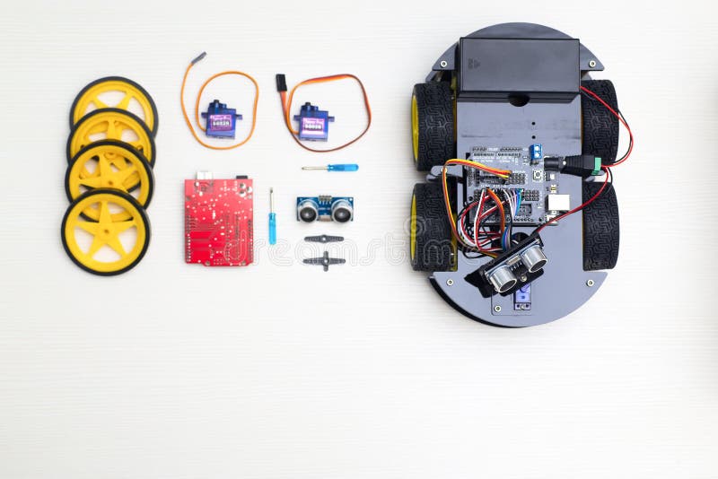 Robot on Wheels and Elements for Robot Assembly. Flat Lay Stock Photo ...