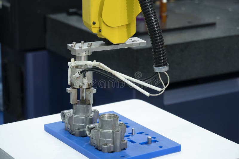 The Robotic Arm Catch the Aluminum Part . Stock Image - Image of ...