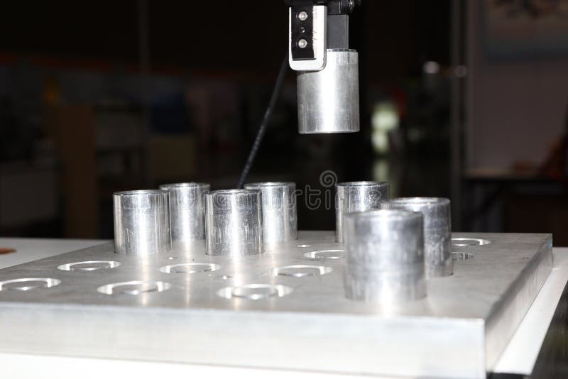 Robotic Arm Clamp Sample and Transfer in Metal Plate Stock Image ...