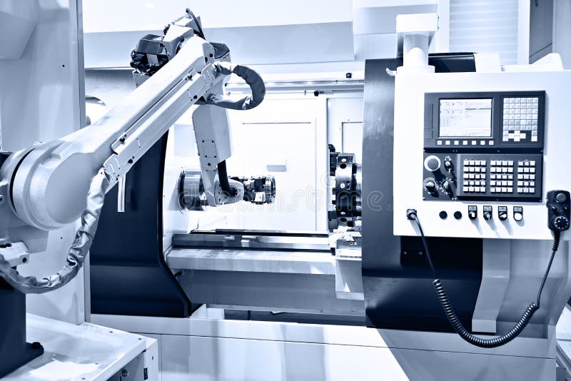 Robotic arm and cnc lathe stock photo. Image of technology - 154870098