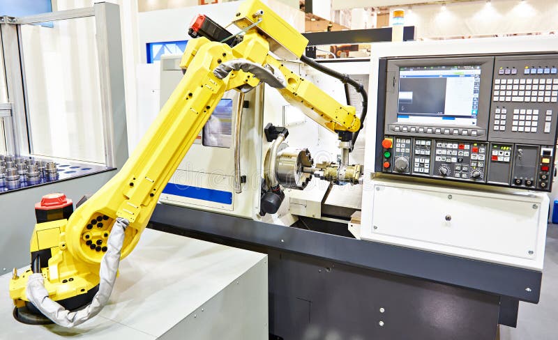 Robotic arm and cnc lathe stock photo. Image of metal - 152391238 Robotic arm and cnc lathe stock photo. Image of metal - 152391238