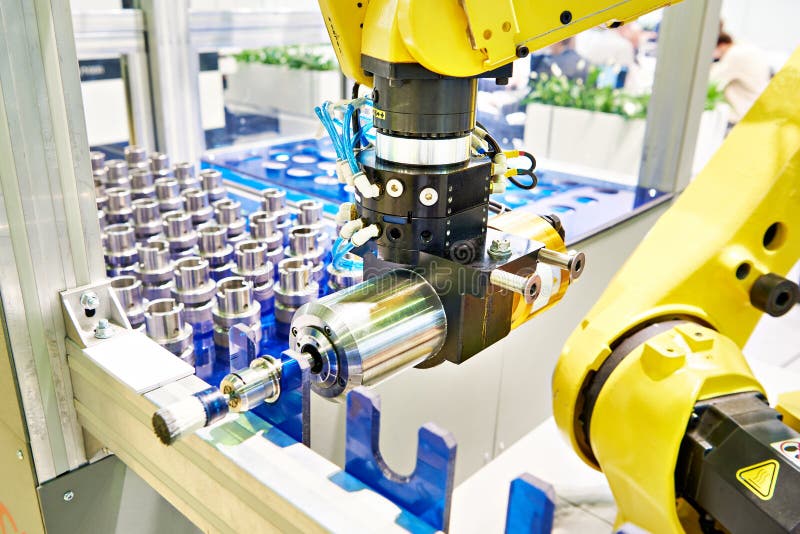 Robotic arm and cnc lathe stock photo. Image of actuator - 151932868