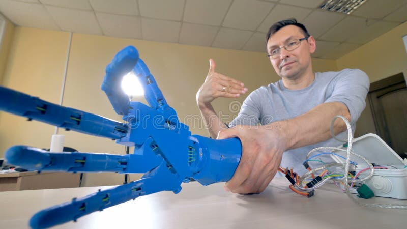 A Robotic Arm Connected To Laptop with Many Wires. Stock Video - Video ...