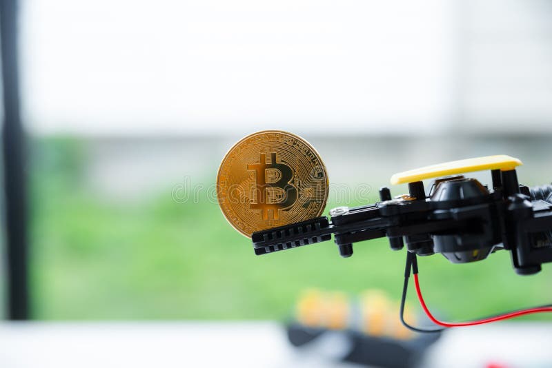 Robotic Arm Holding Bitcoin Stock Photo - Image of world, project ...