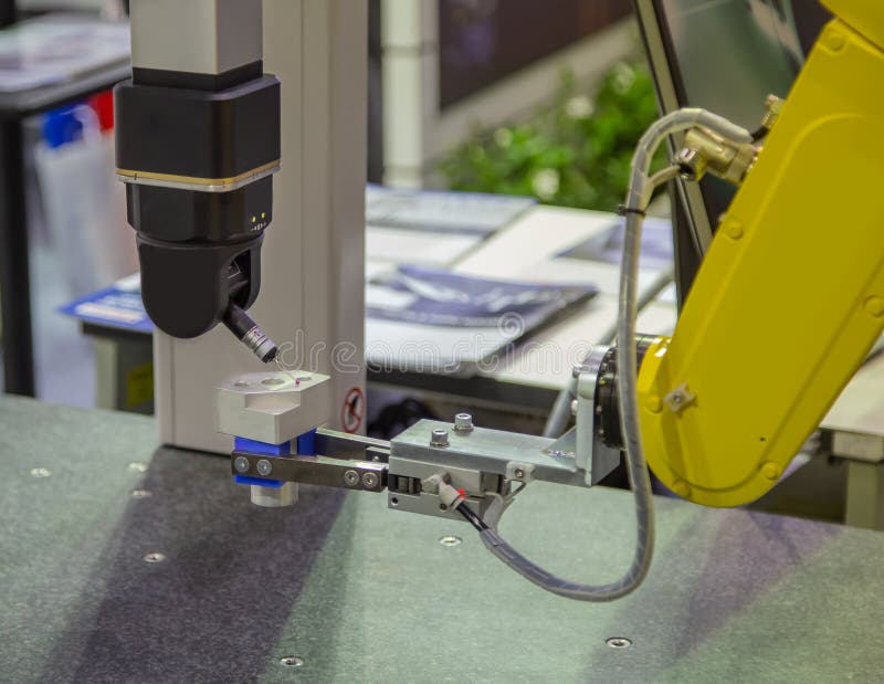 Robotic Arm Loading Workpiece To CMM Machine Stock Photo - Image of ...