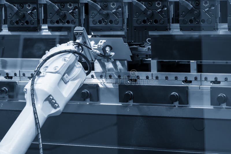 The Robotic Arm Operation at Hydraulic Bending Machine. Stock Image ...