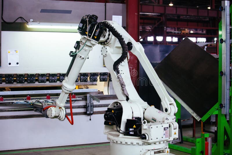 Robotic Arm Working with Metal Sheet at Hydraulic Bending Machine Stock ...