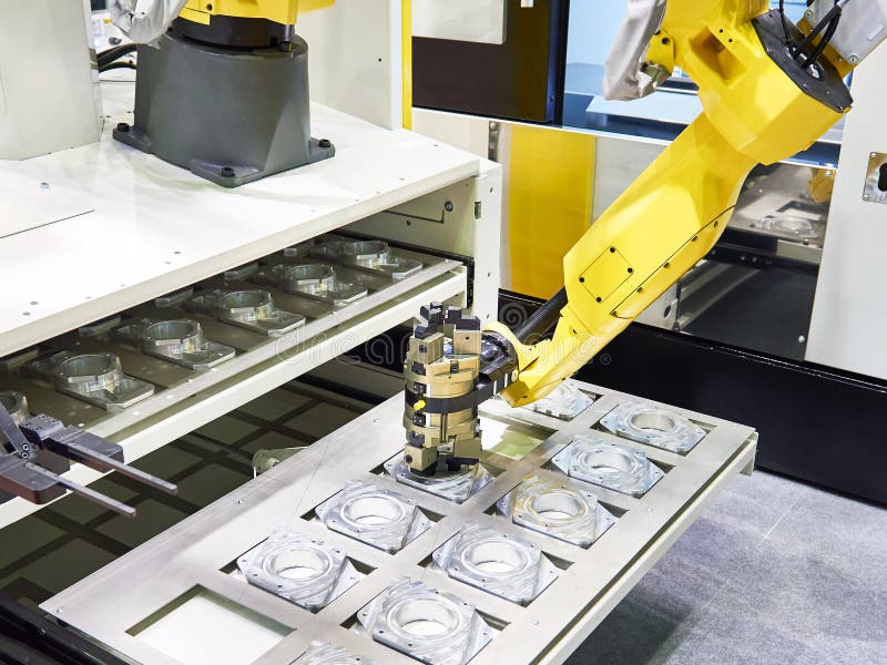 Robotic arm and workpieces stock image. Image of milling - 152216489