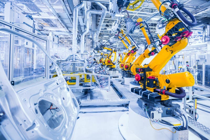 Robots in a car plant stock photo. Image of auto, bodywork - 241121838