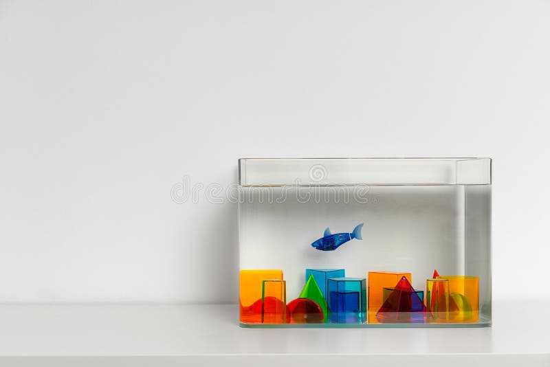Robotic fish in aquarium stock image. Image of furniture - 247480423