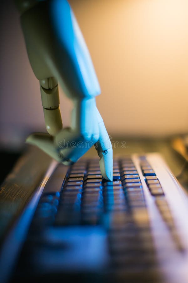 Robotic Hand Typing on a Computer Keyboard Stock Photo - Image of ...