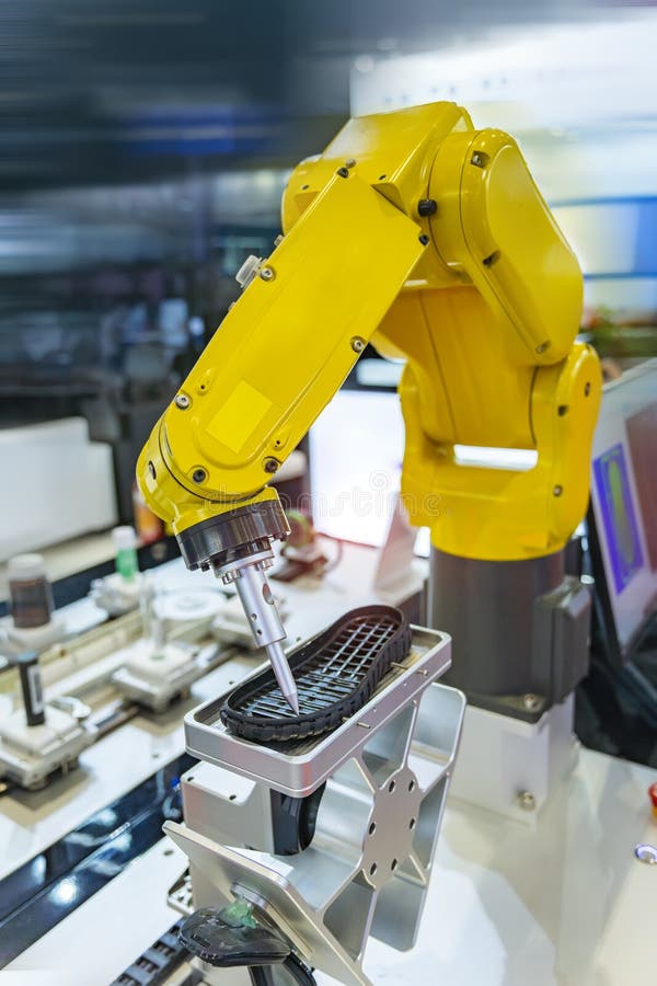 Robotic Machine Arm Measure the Rubber Soles Stock Image - Image of ...