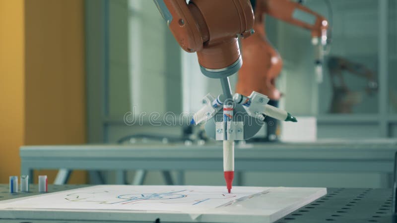 Robot is Drawing Under Supervision of Young Engineers Stock Video ...