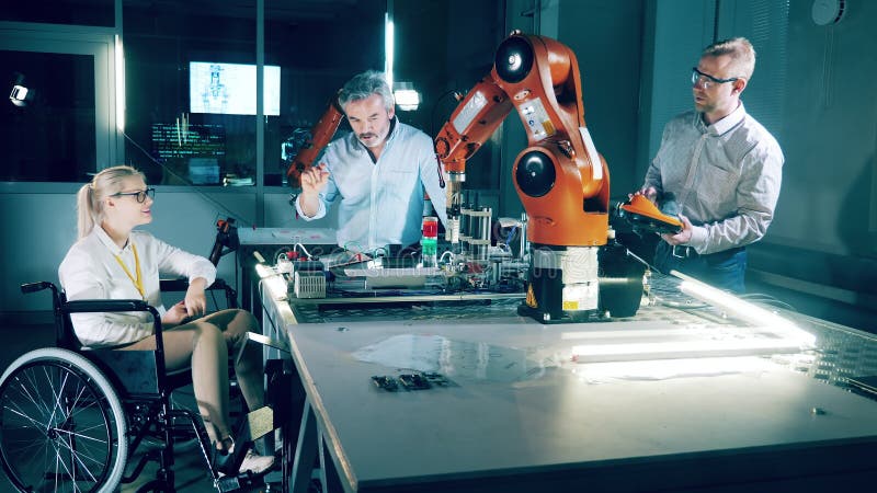 Disability Concept, Disabled Person. Robotics Lab with a Group of ...