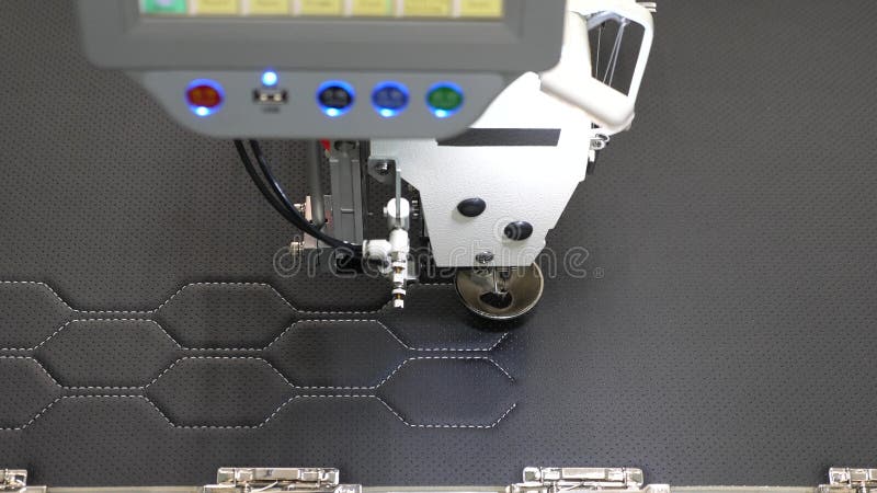 Robotics Works in the Tailoring Production Line. Robot Sewing Machine ...