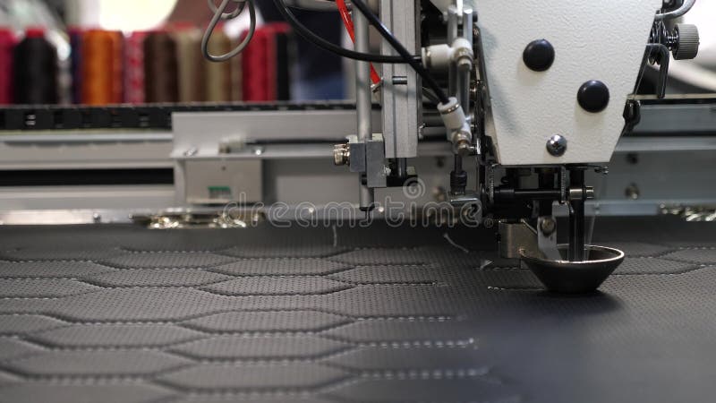 Robotics Works in the Tailoring Production Line. Robot Sewing Machine ...