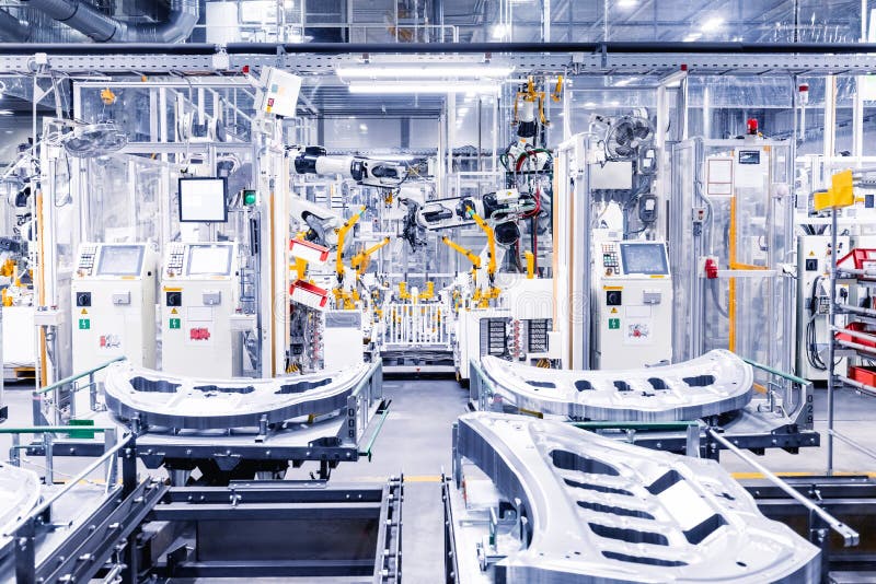 Robots in a car plant stock photo. Image of assembly - 256952962