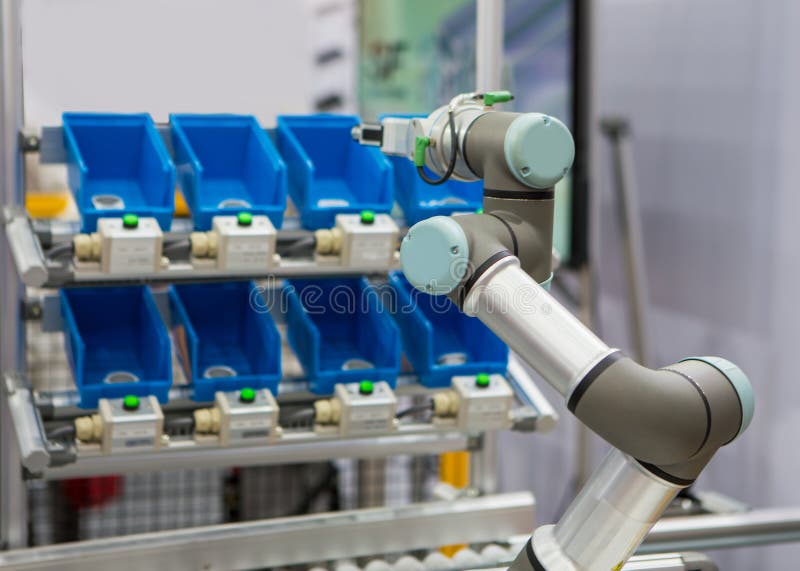Robots Pick Up Parts from Rack Stock Photo - Image of components, goods ...