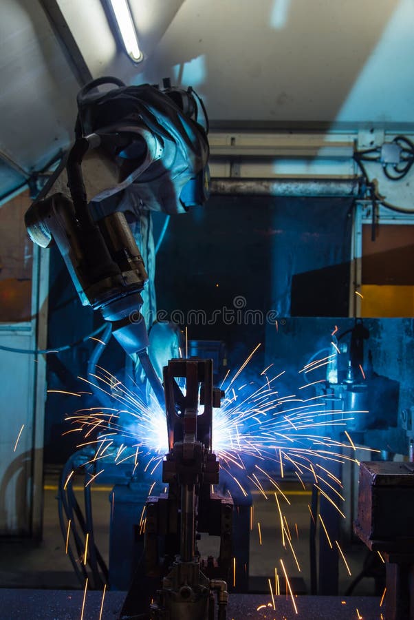 Robots Welding in a Car Factory Stock Photo - Image of automation ...