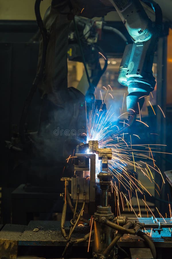 Robots Welding in a Car Factory Stock Photo - Image of automation ...